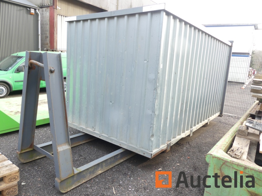 Galvanised construction site container fixed on container chassis - Co ...